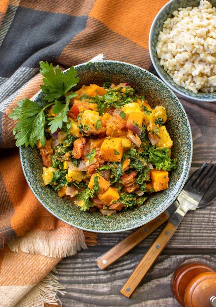 Kale and Sweet Potato Stew with Yellow Squash - The Vegan Atlas